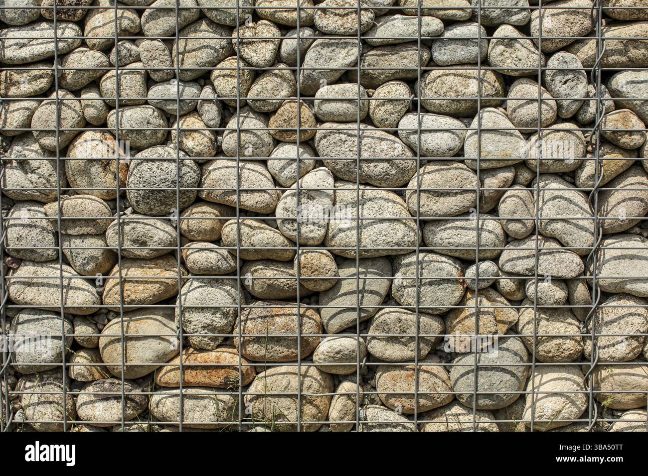 Caged rocks hi-res stock photography and images - Alamy