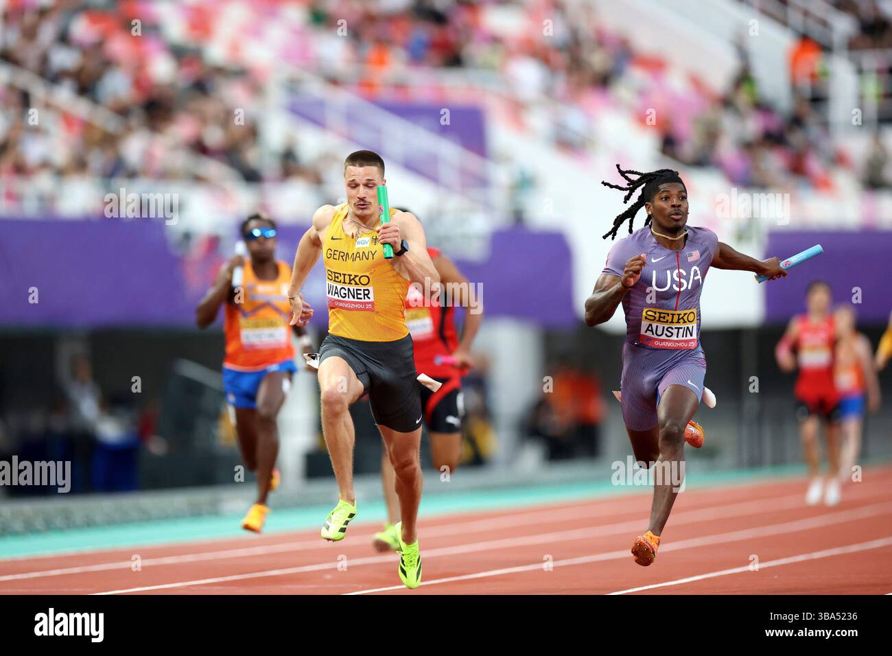 German sprinter Julian Wagner, left, and Pjai Austin of the USA, right ...