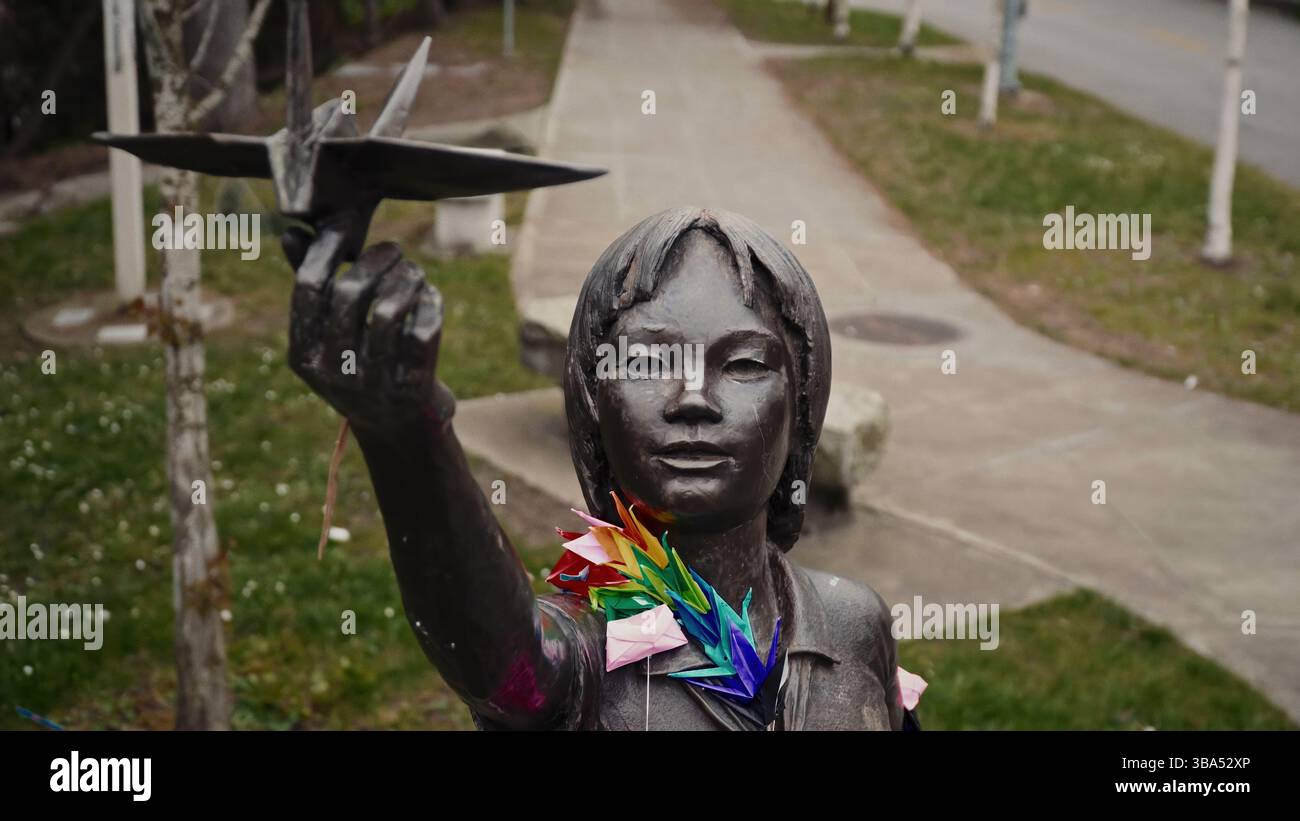 SEATTLE, WASHINGTON - APRIL 10, 2017 - Sadako Sasaki statue holding ...