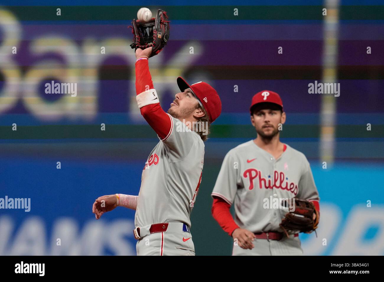 Philadelphia Phillies second baseman Bryson Stott catches a pop up hit ...