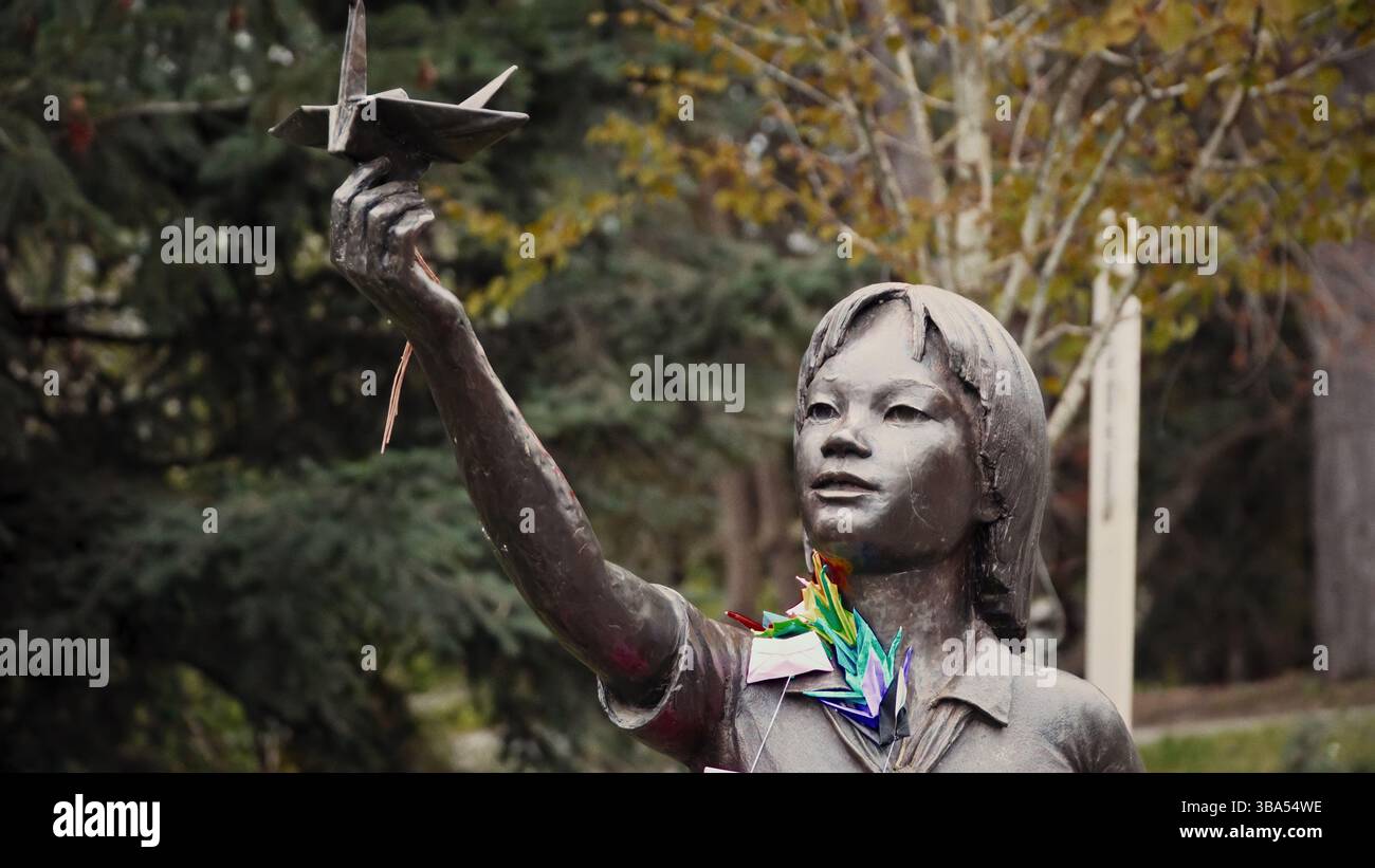 SEATTLE, WASHINGTON - APRIL 10, 2017 - Sadako Sasaki statue holding ...