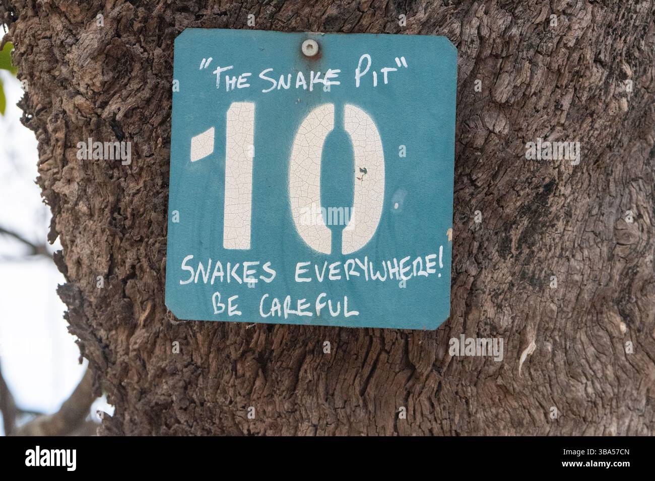 Sign warning of snakes at a bush campground, Lakefield National Park ...