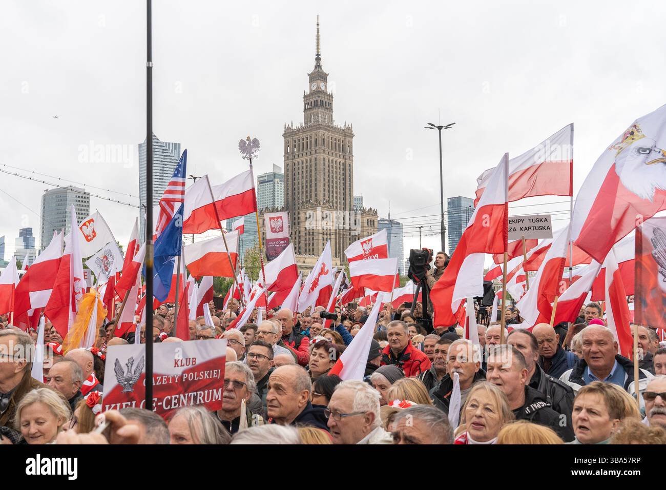 Protesters wave Polish flags during the anti-migration protest ...