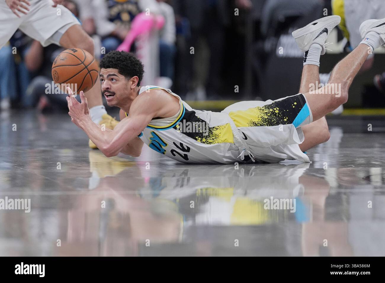 Indiana Pacers guard Ben Sheppard (26) chases a loose ball in the ...