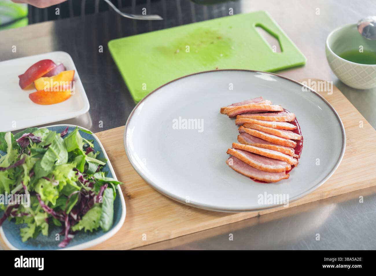The chef serves roast duck Stock Photo - Alamy