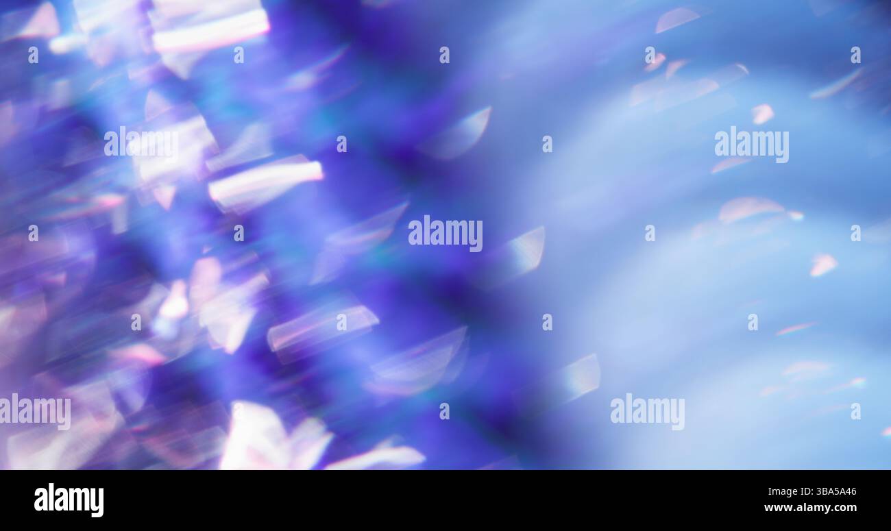 Crystal light. Blurred gleaming particles. White sparkling lens flare ...