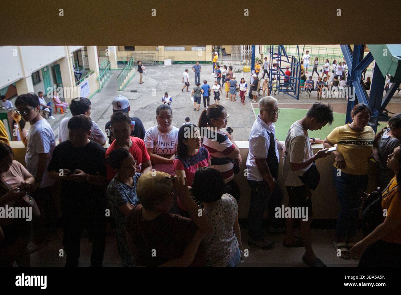Manila, Ncr, Phillippines. 12th May, 2025. Filipino voters line up to ...