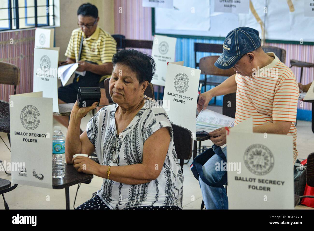 May 12, 2025, Manila, Ncr, Phillippines: Voters shading their ballots ...
