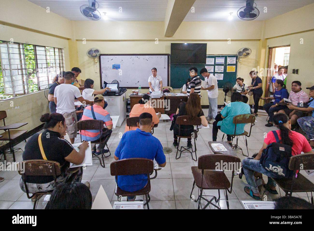 Manila, Ncr, Phillippines. 12th May, 2025. Filipinos cast their votes ...