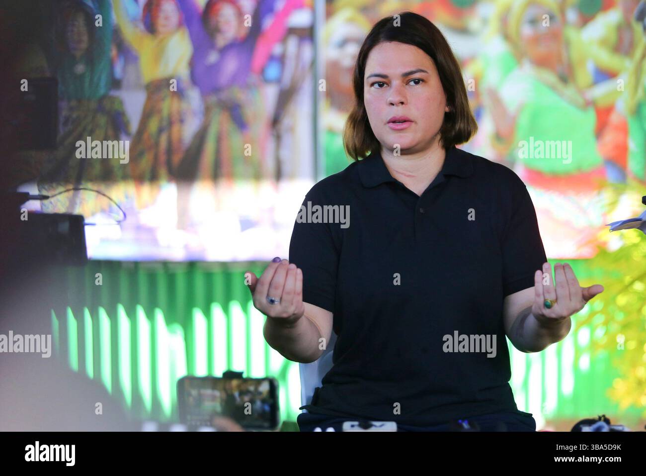 Philippine Vice President Sara Duterte gestures as she speaks to the ...