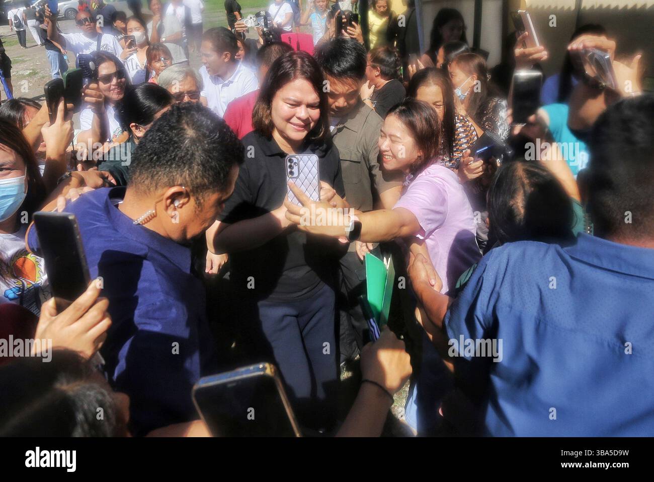 Philippine Vice President Sara Duterte greets supporters as she arrives ...