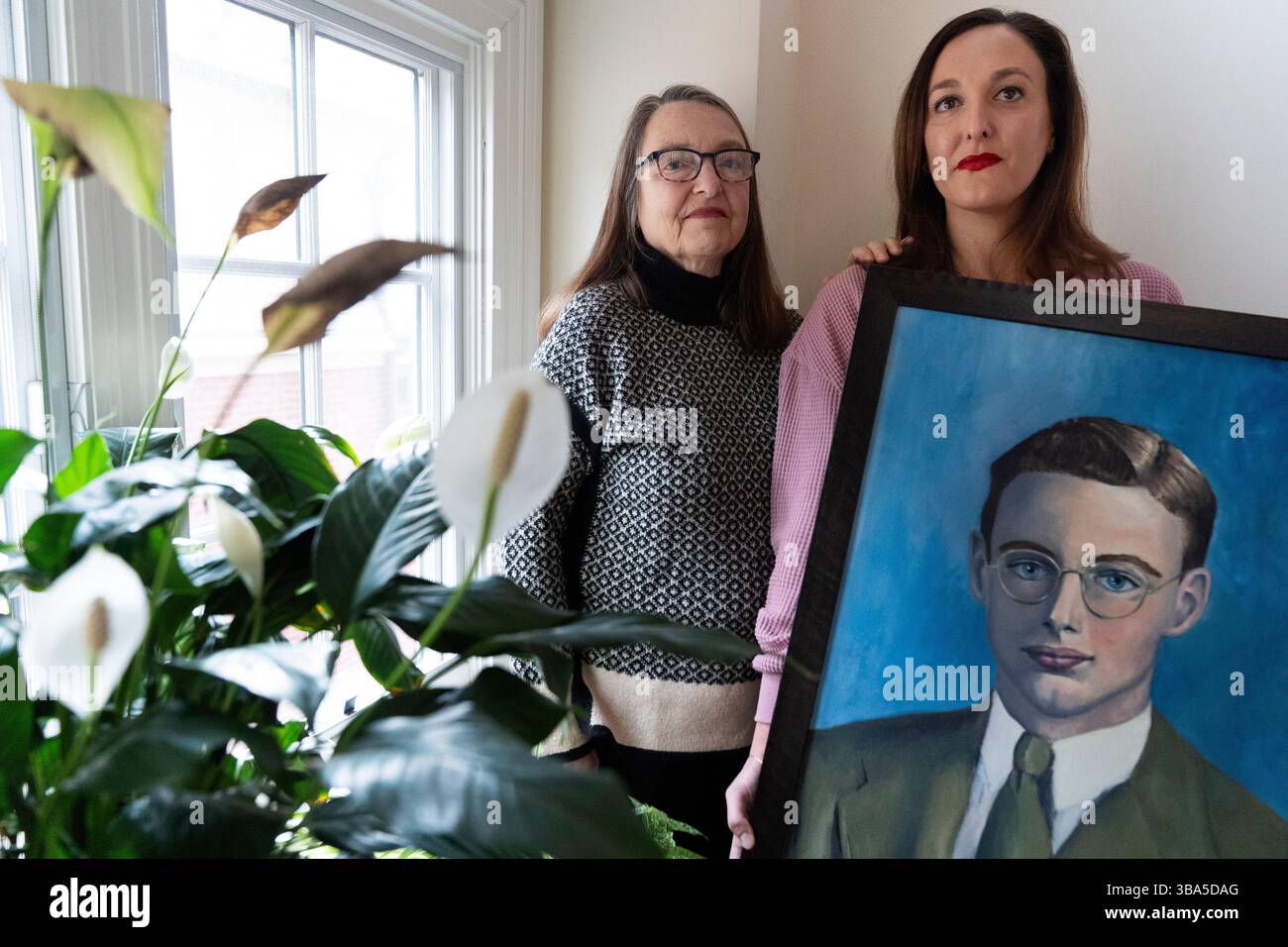 Cathy Votaw, 69, left, and her daughter Anna Eisenberg, pose with a ...