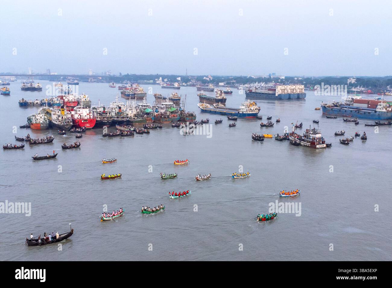 Boat races in Bangladesh. Traditional Sampan race in Karnaphuli River ...