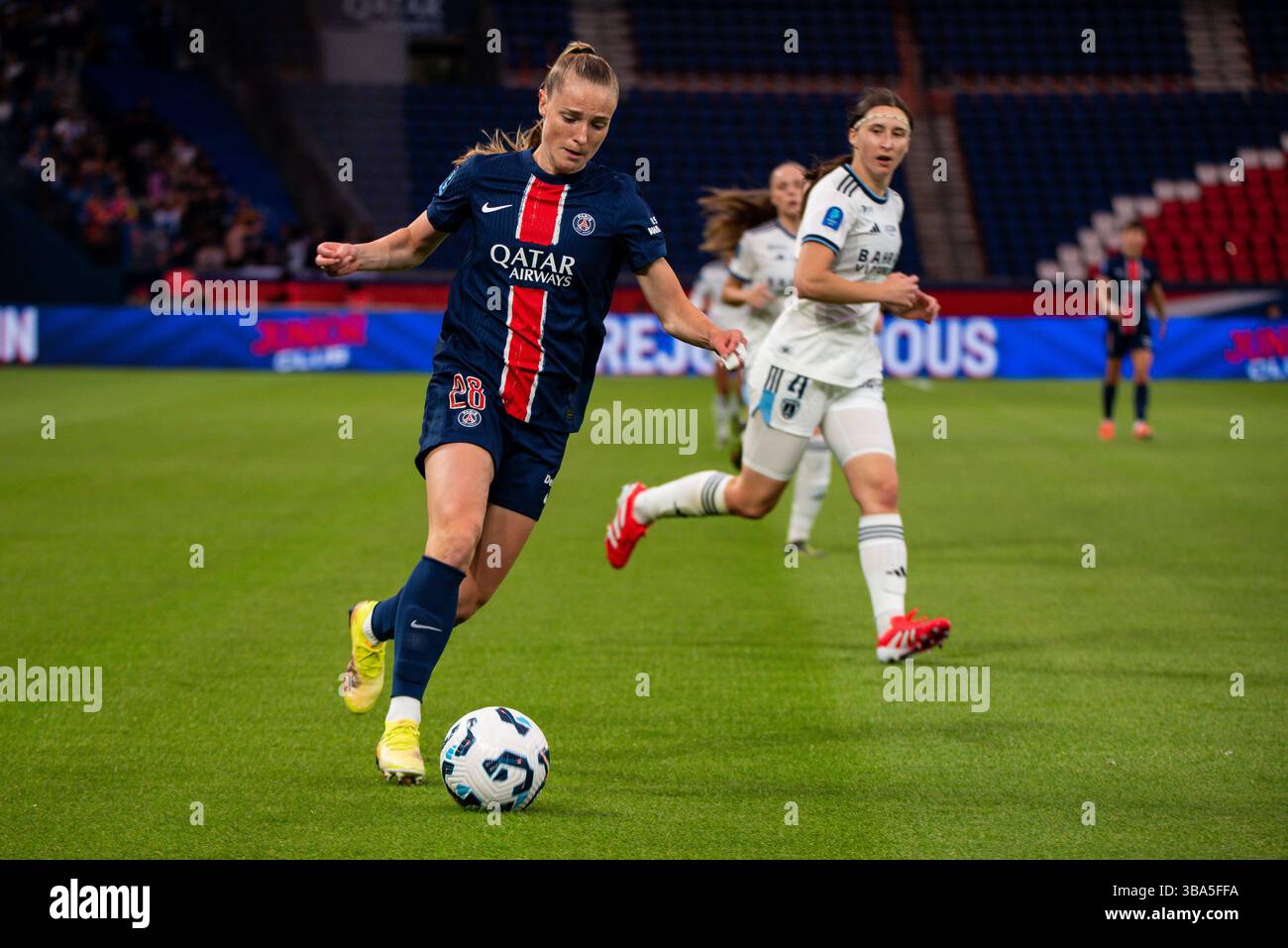Jade Le Guilly of Paris Saint Germain controls the ball during the ...