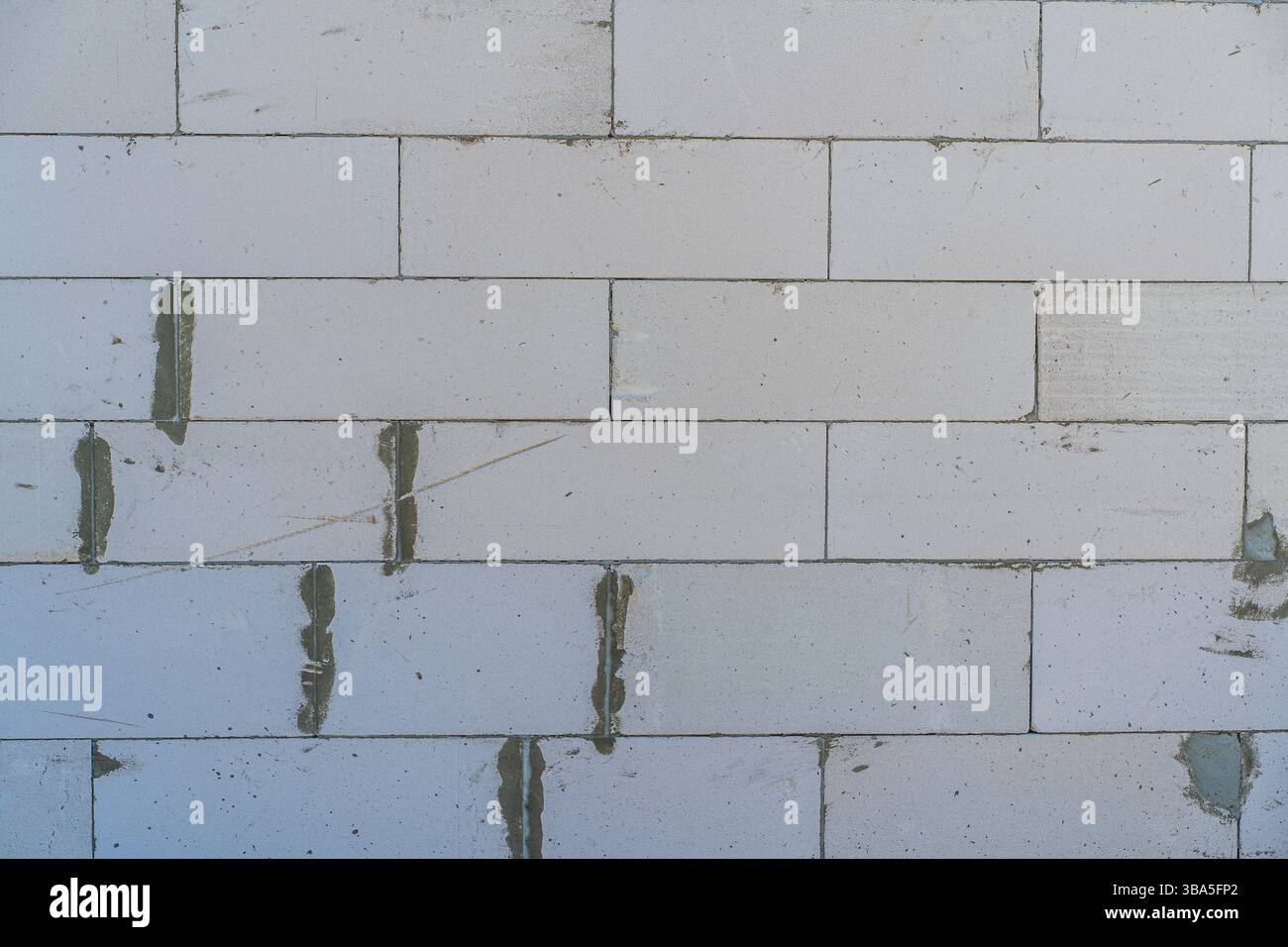 Background, aerated concrete block wall in full screen Stock Photo - Alamy