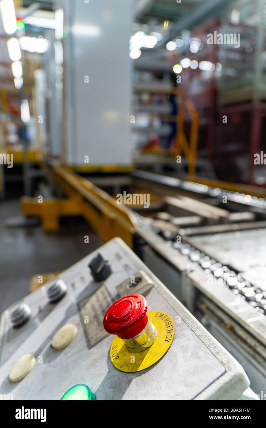 Emergency Stop installed at line conveyor in refrigerator manufacturing plant. START - STOP ...