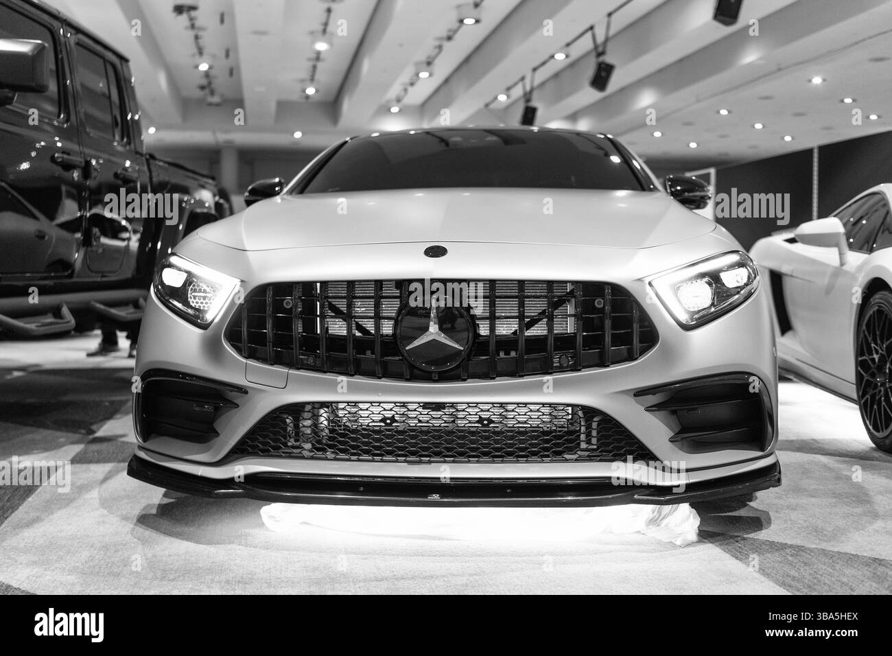 New York City, USA - March 27, 2024: Mercedes Benz CLS bright green car ...