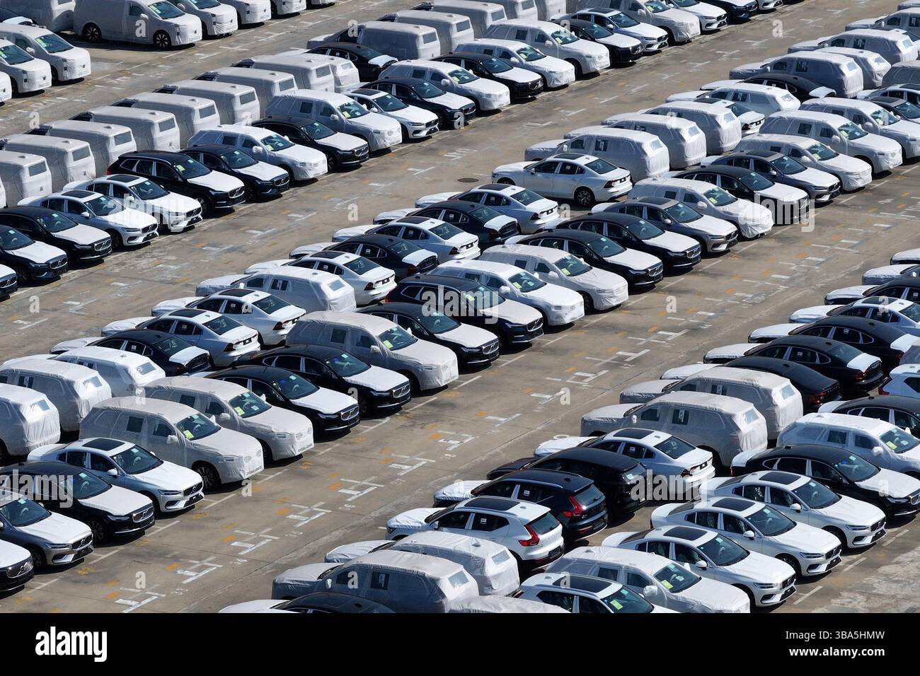 Aerial view of new cars waiting for shipment at a port in Nanjing in ...