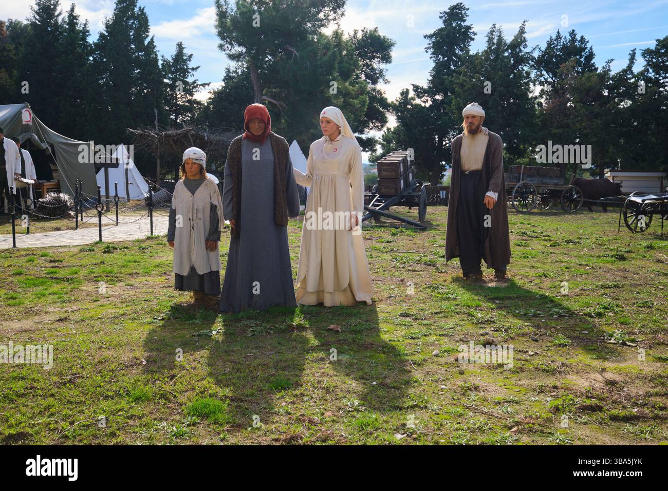 A grieving family arrives at the front of the hospital. At The ...
