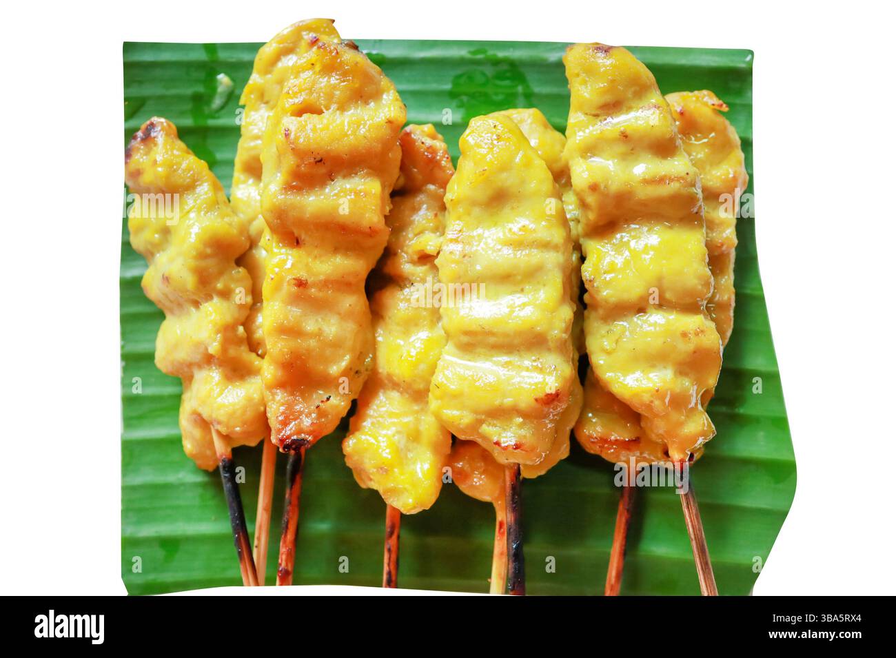Die cut of Pork satay set on white isolated Stock Photo - Alamy