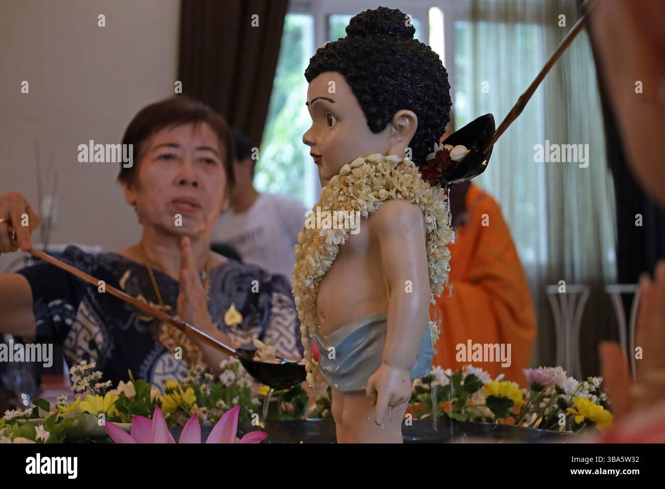 Banda Aceh, Aceh, Indonesia. 12th May, 2025. Indonesian Buddhists pour ...