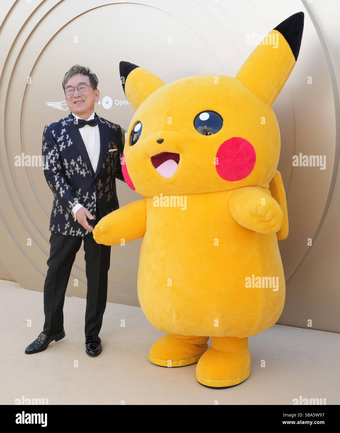 Tsunekazu Ishihara and Pikachu arrives at the Gold House 4th Annual ...