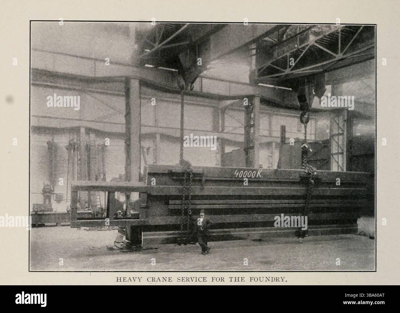 HEAVY CRANE SERVICE FOR THE FOUNDRY. A large lathe bed in cleaning room ...