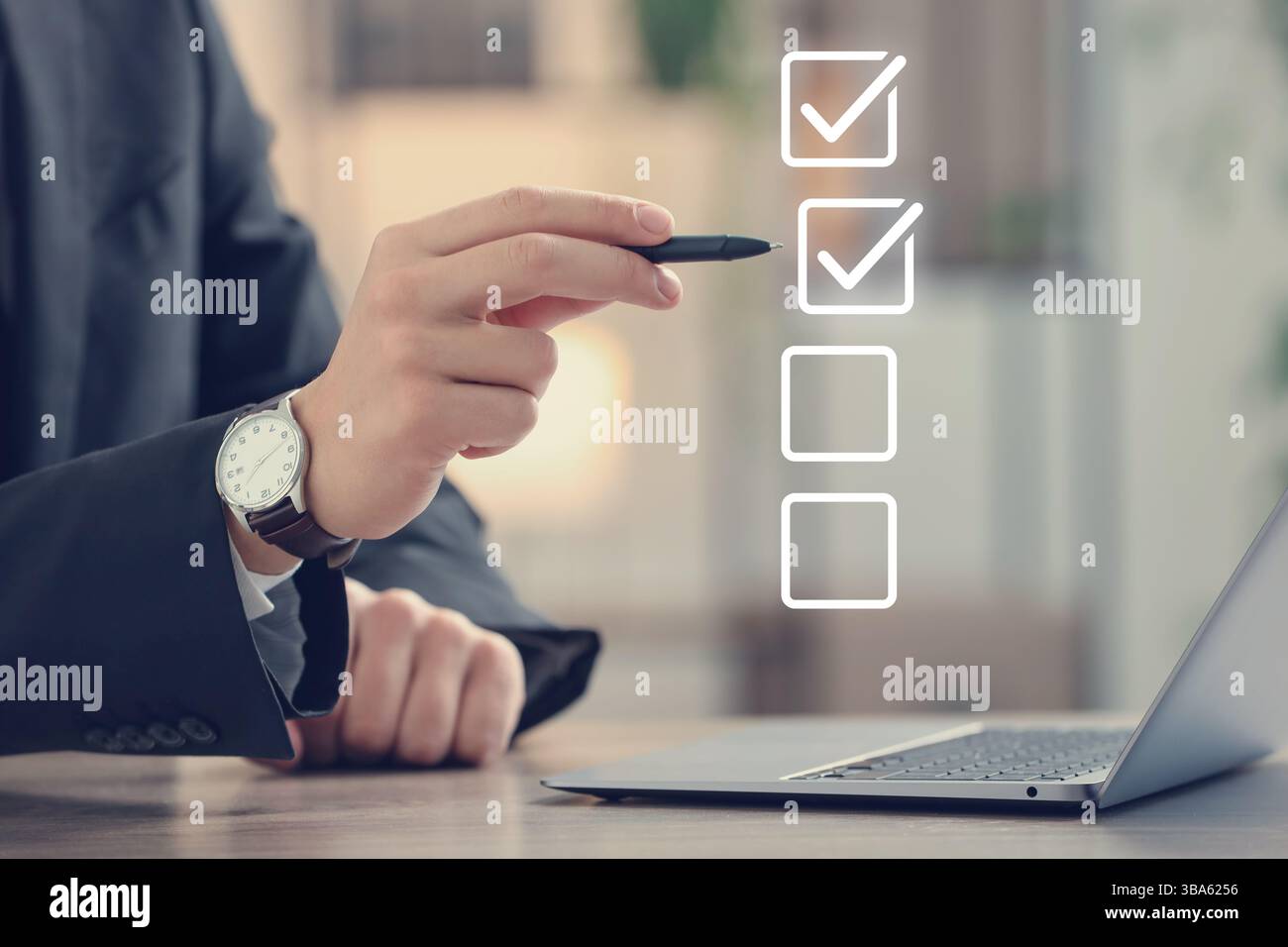 Approved. Man using laptop and checking boxes on virtual screen at ...