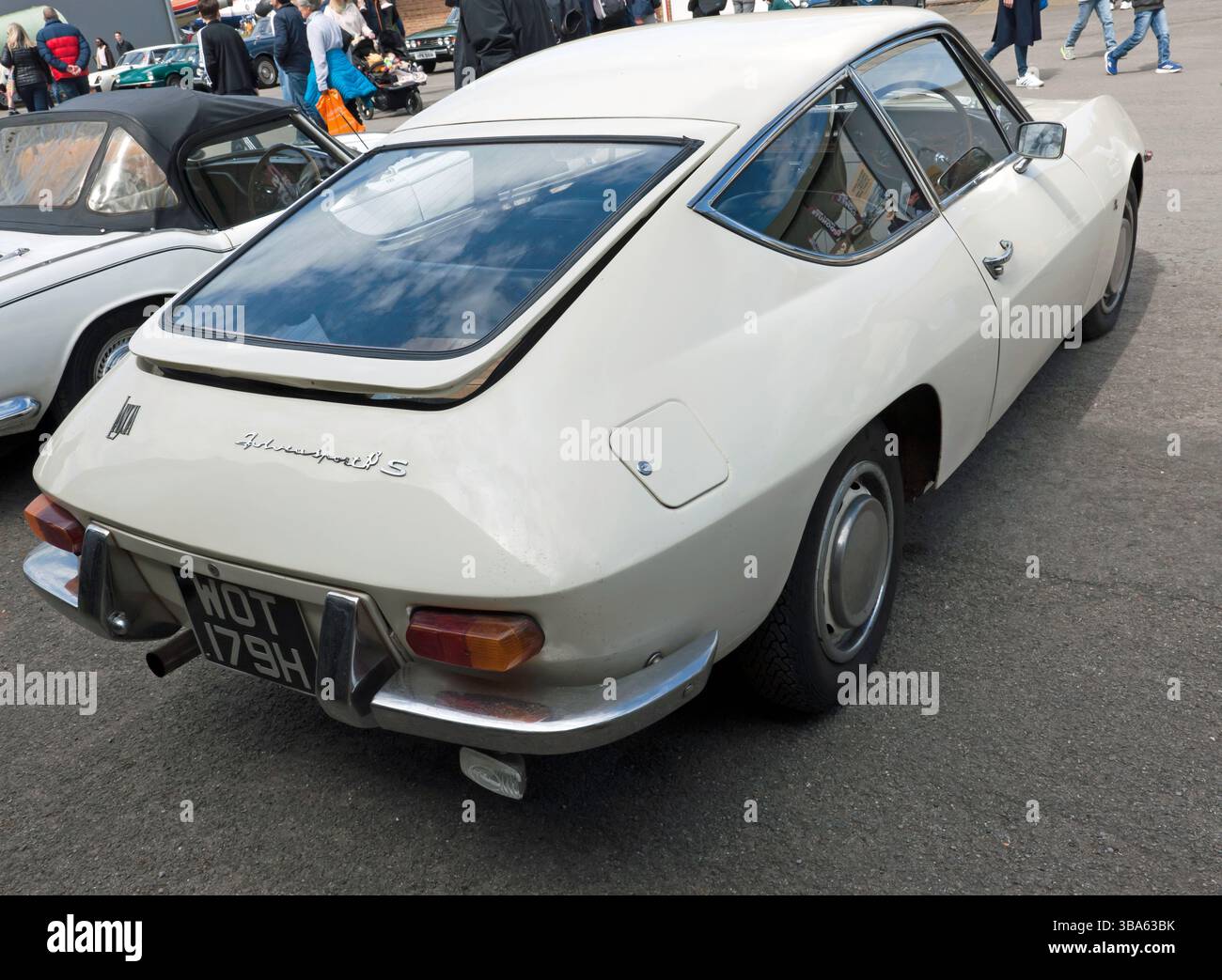 Three-quarters rear view of a White, 1969, Lancia Fulvia Sport S, on ...
