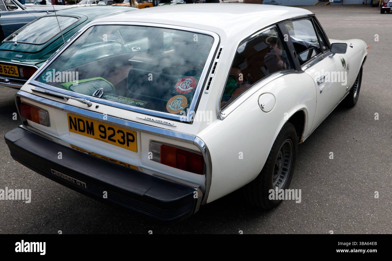 Three-quarter rear view of a White, 1975, Jensen GT on display at the ...