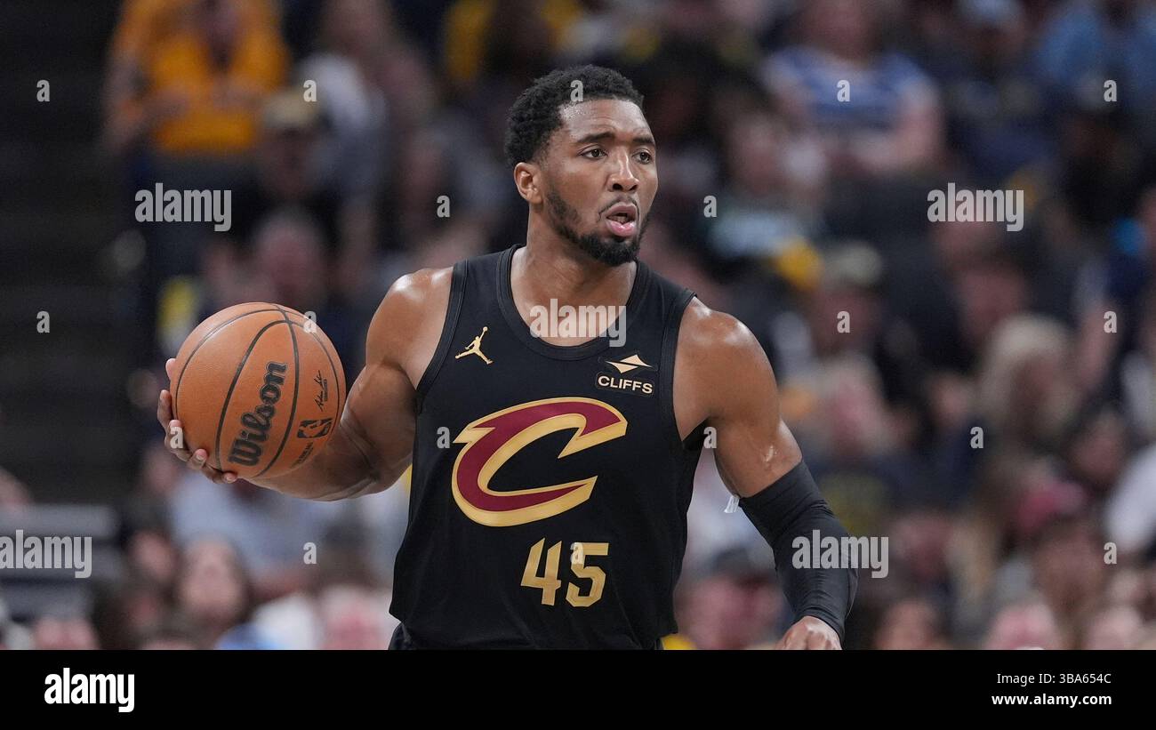 Cleveland Cavaliers guard Donovan Mitchell (45) moves the ball down ...