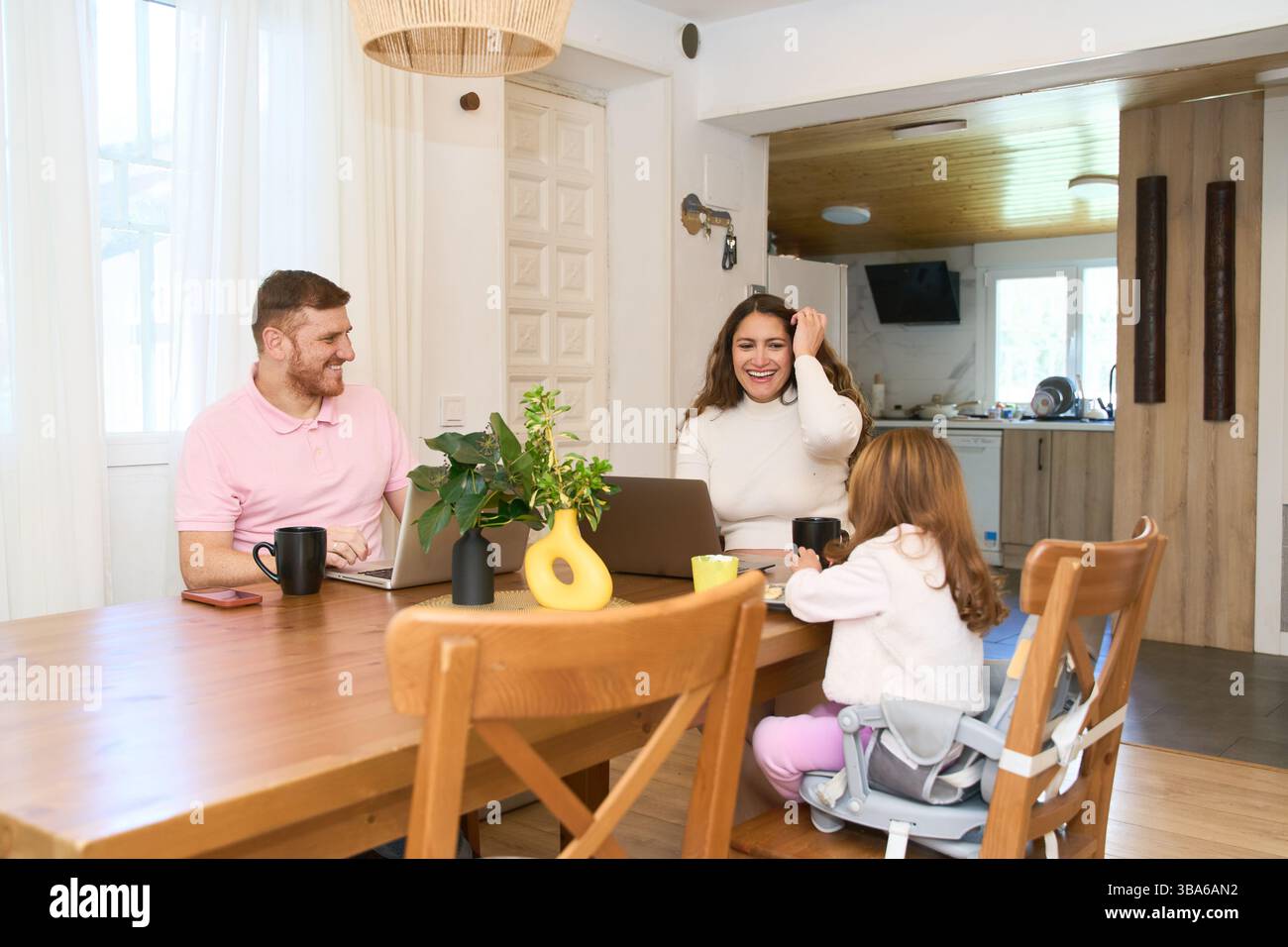 Parents work remotely laptops hi-res stock photography and images - Alamy