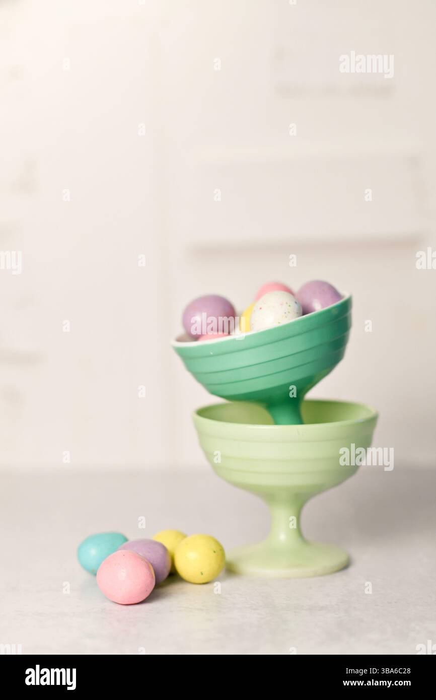 Colorful Easter candy eggs in stacked mint green dessert cups Stock ...