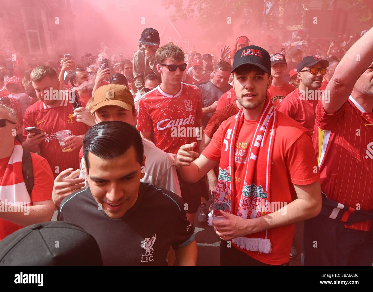 Liverpool, UK. 11th May, 2025. Fans walk towards the ground ahead of ...