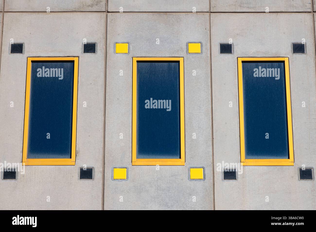 Three windows on concrete wall with yellow trim - geometry minimalism ...