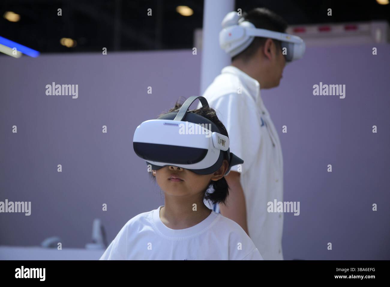 A humanoid robot is presenting for tourists at the China Beijing International High-tech Expo ...
