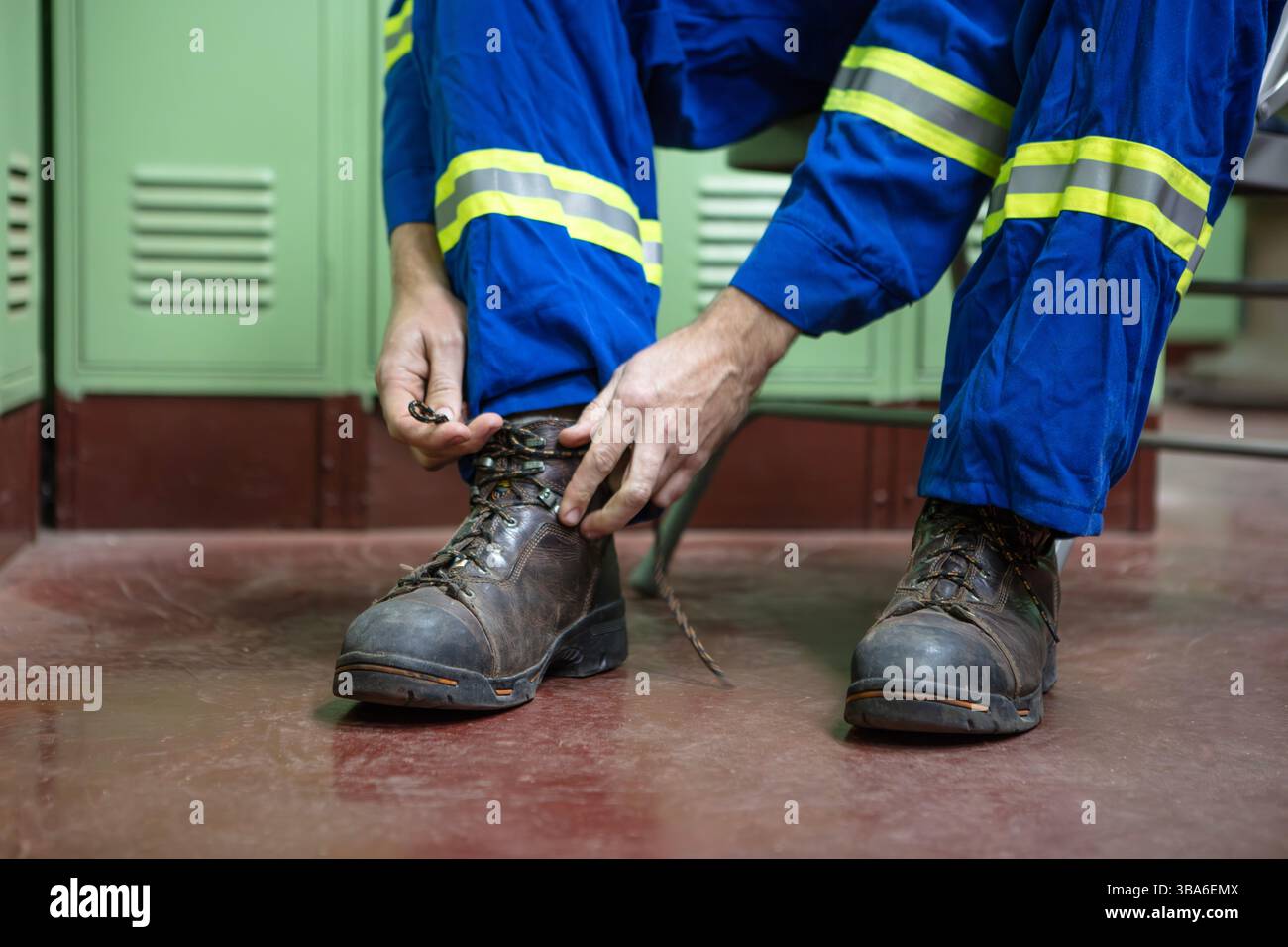 Putting on safety boots hi-res stock photography and images - Alamy