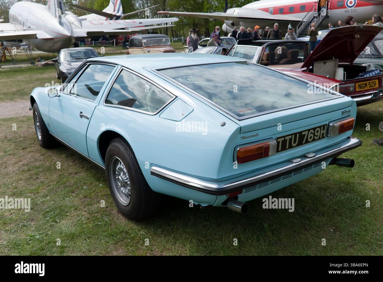Three-quarter rear view of a Blue, 1970, Maserati Indy, on display at ...