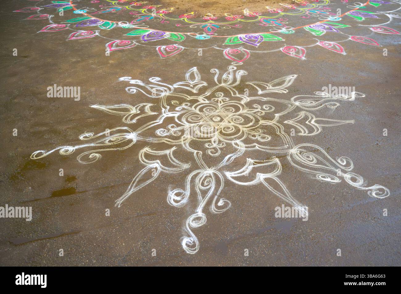 Kolam, colorful sandpainting with rice powder drawn by women and girls ...