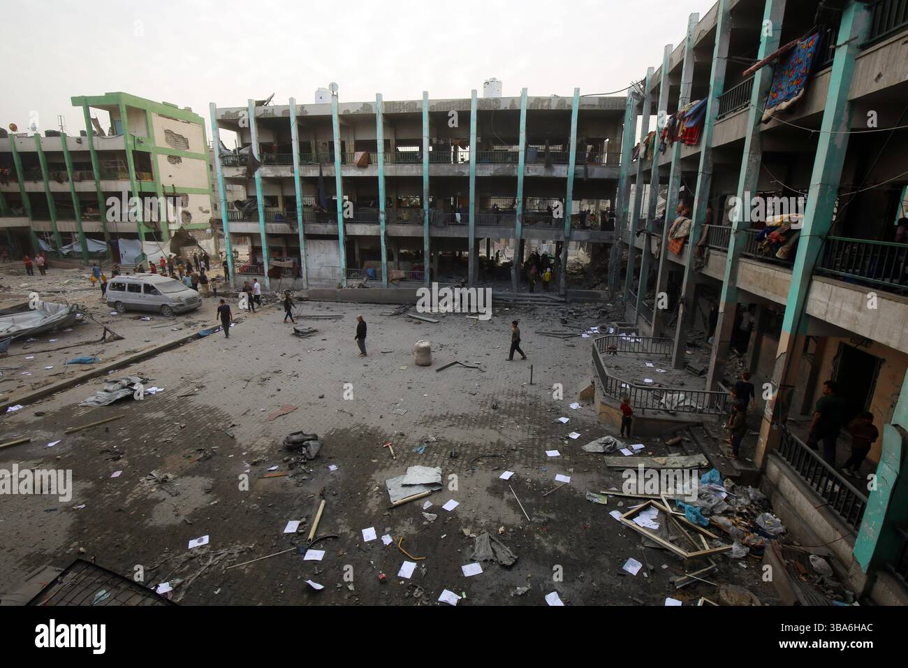 Palestinians inspect the rubble of A school Fatima, Asad s daughter ...
