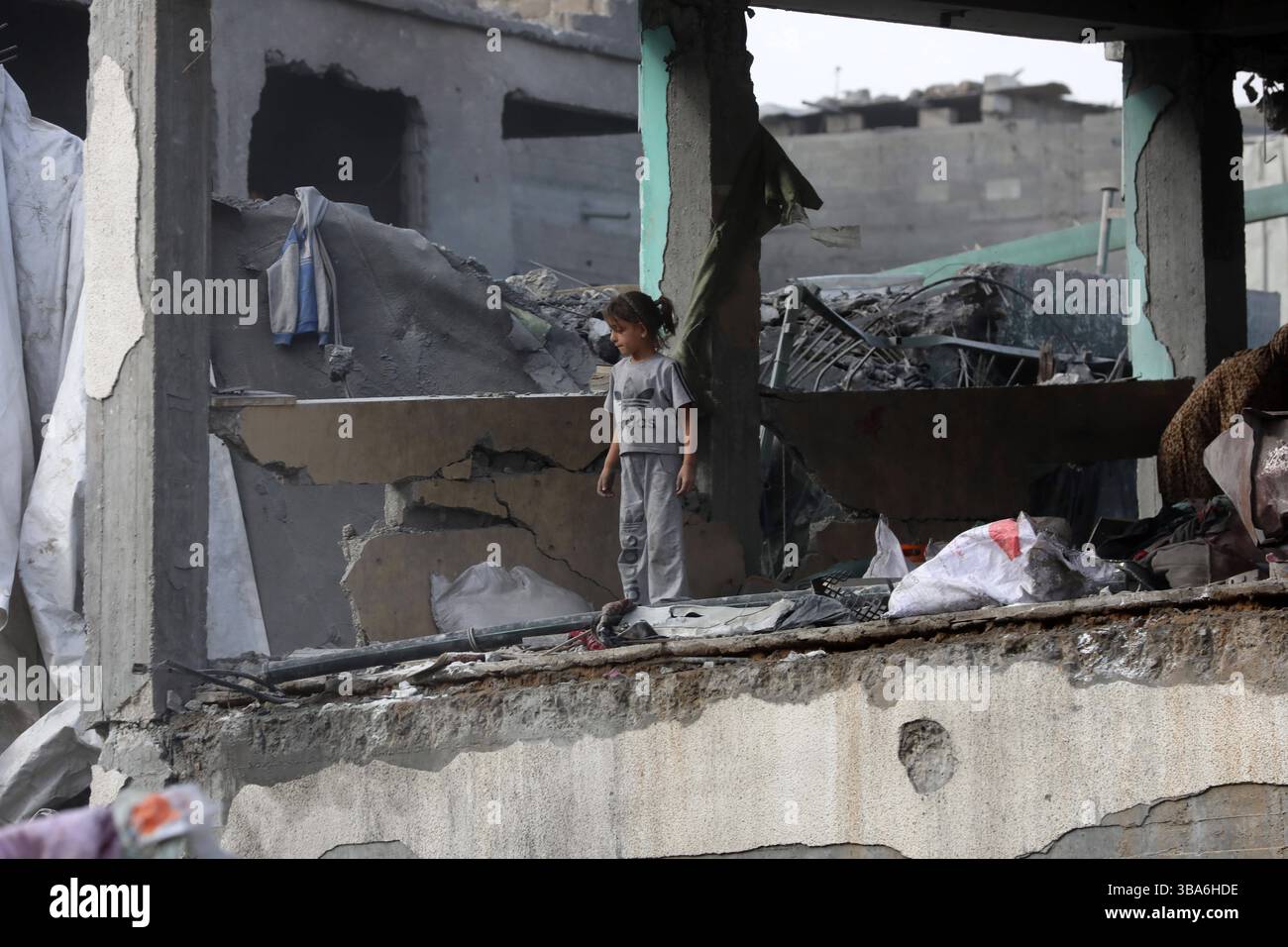 Palestinians inspect the rubble of A school Fatima, Asad s daughter ...