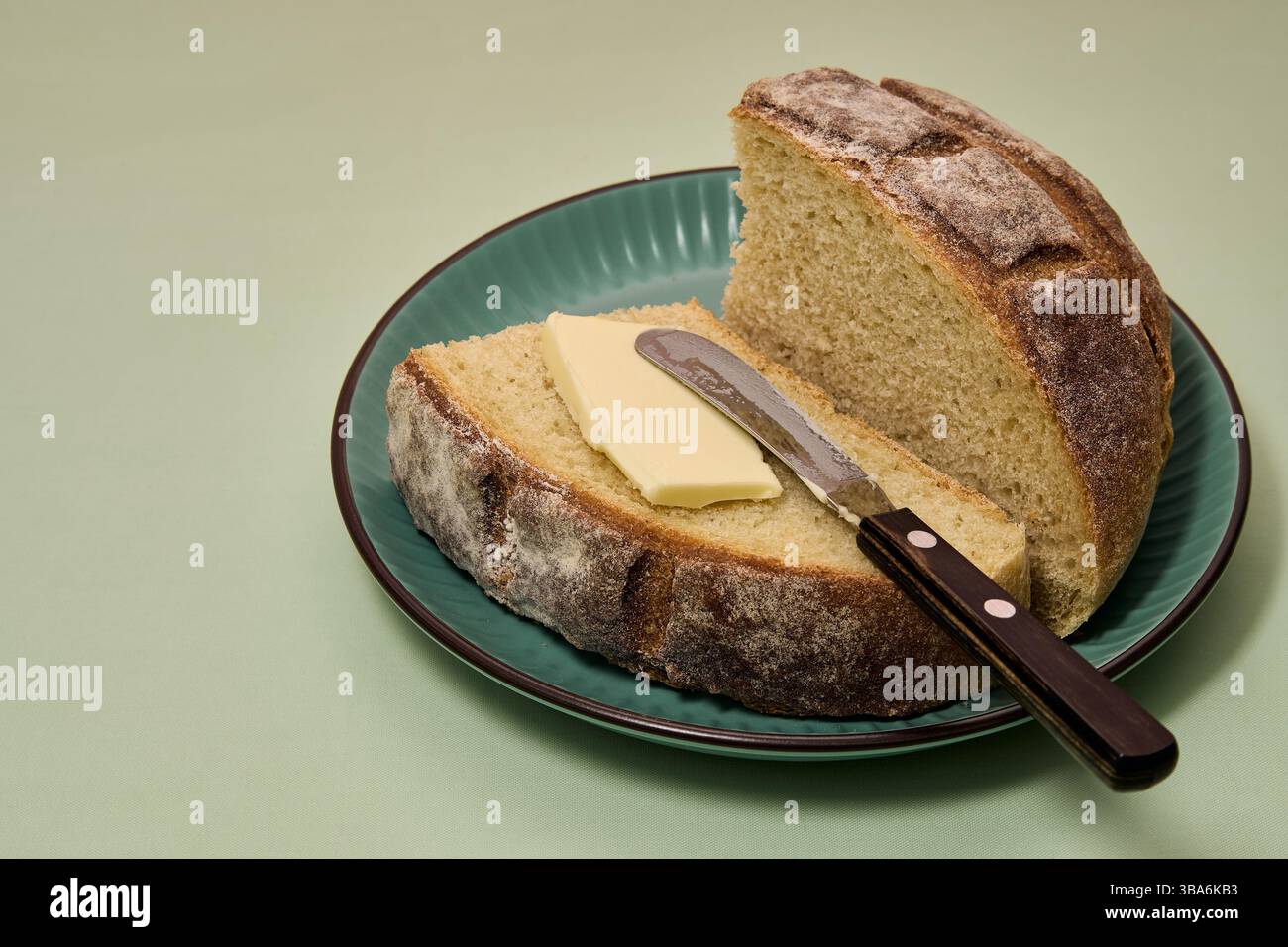 Sourdough Bread and Butter Stock Photo - Alamy