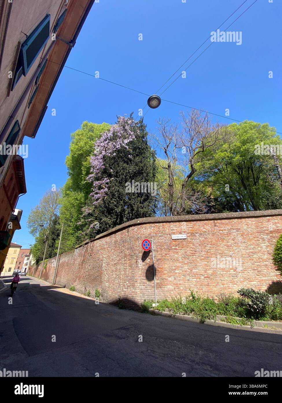 Cremona, Italy - April 5th 2025 An Urban Landscape with an Old Brick ...