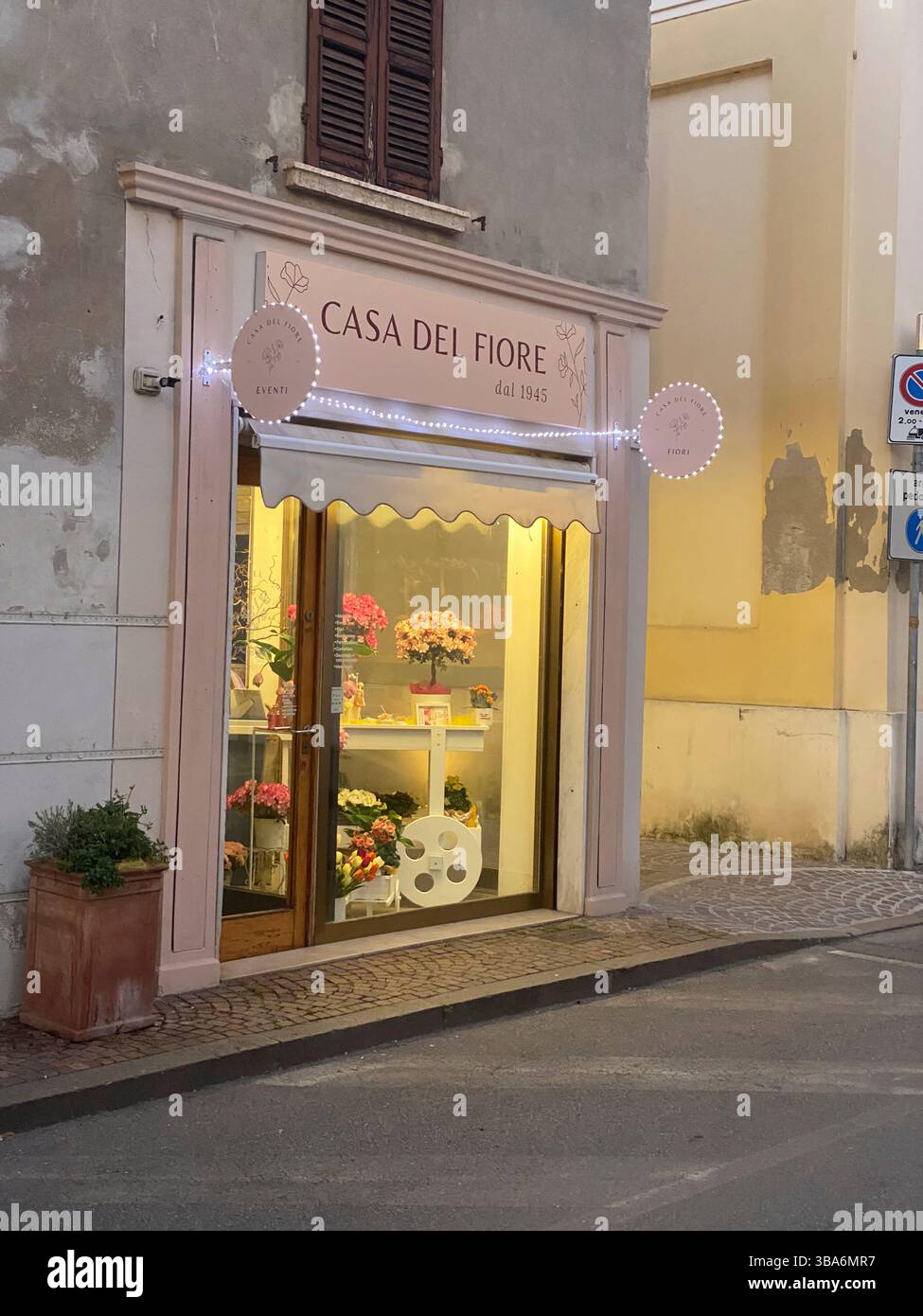 Pontevico, Italy - April 5th 2025 A Charming Little Flower Shop Bathed ...