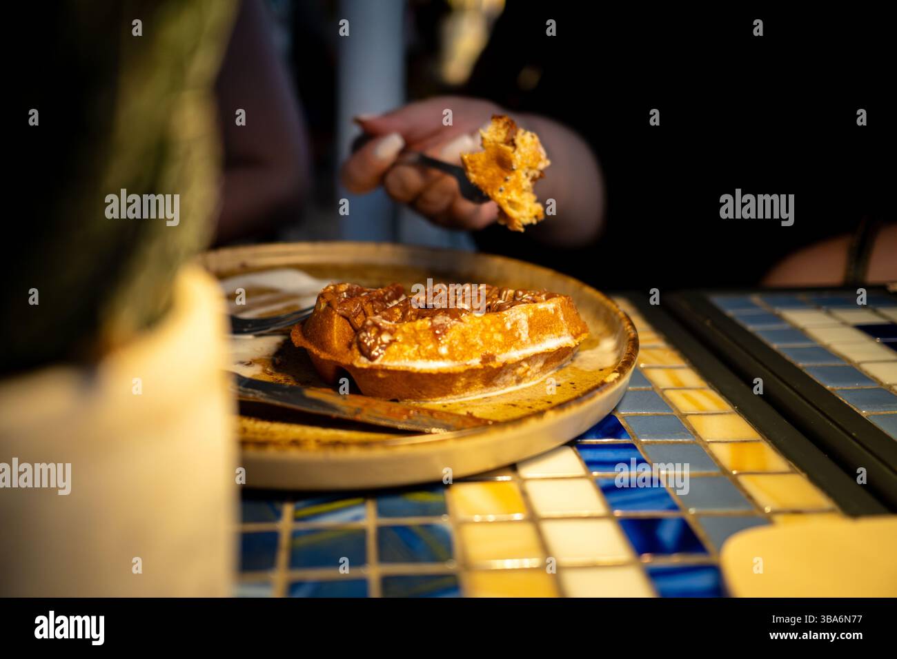 Person eating gourmet dessert hi-res stock photography and images - Alamy