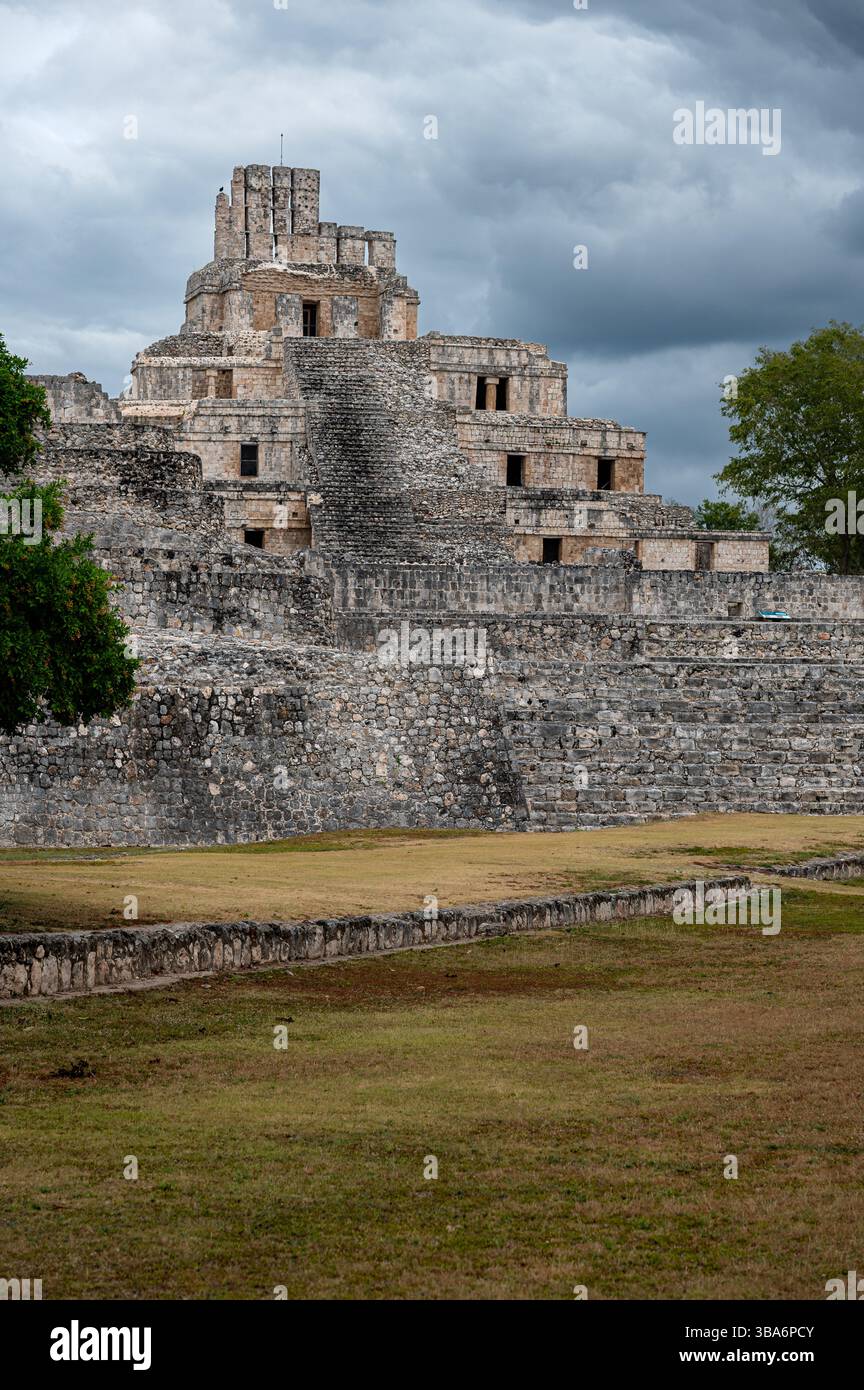 Mayan temple of the five storeys with dark clouds, at Edzna, Campeche ...