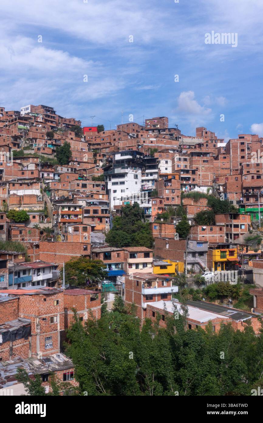 Cable car view of the hillside slums of Comuna 13, in Medellin ...