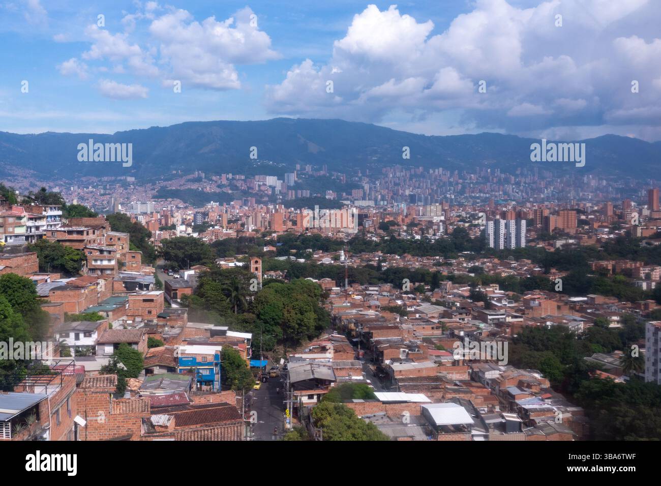 Cable car view of the hillside slums of Comuna 13, in Medellin ...