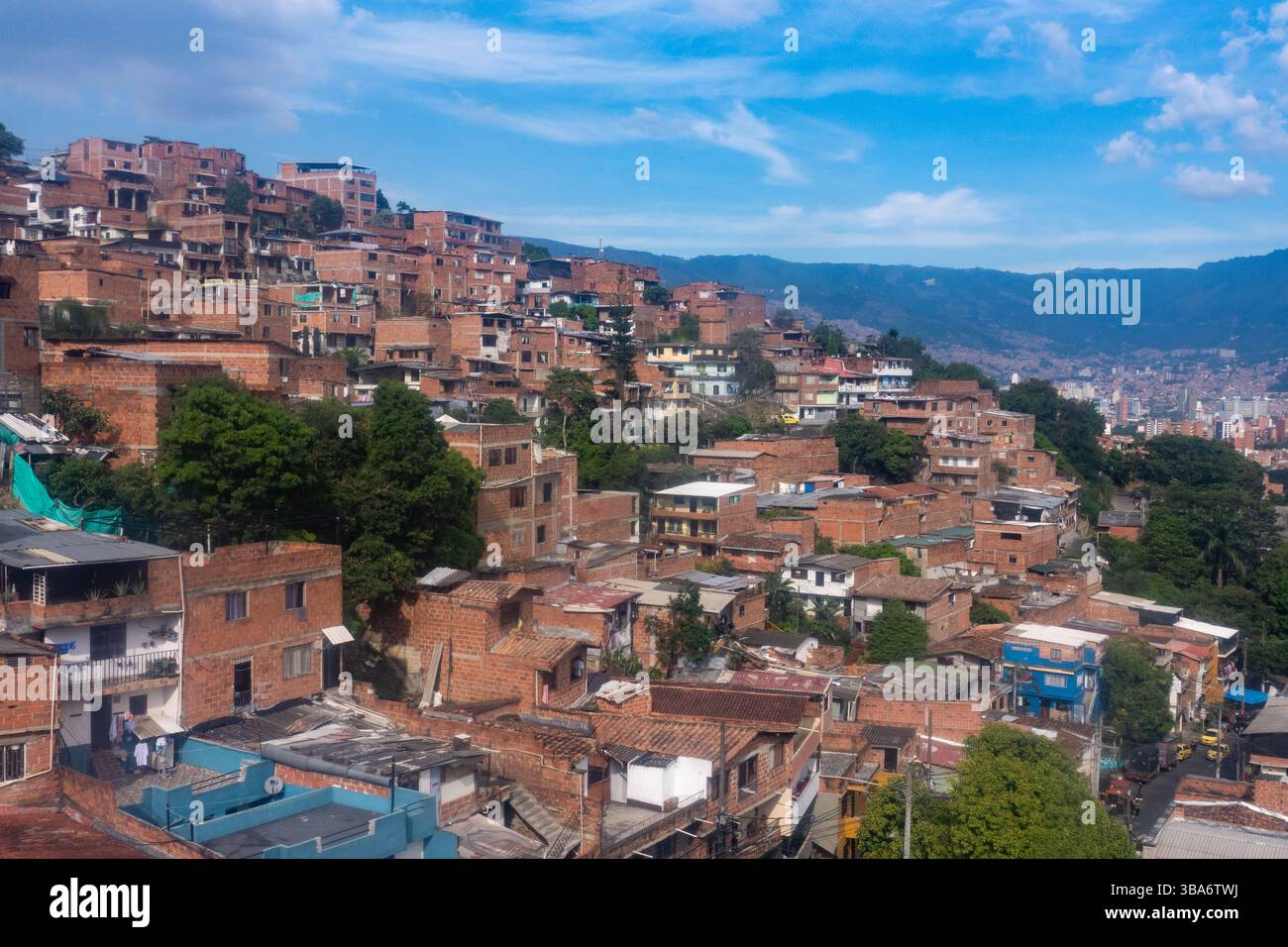 Cable car view of the hillside slums of Comuna 13, in Medellin ...
