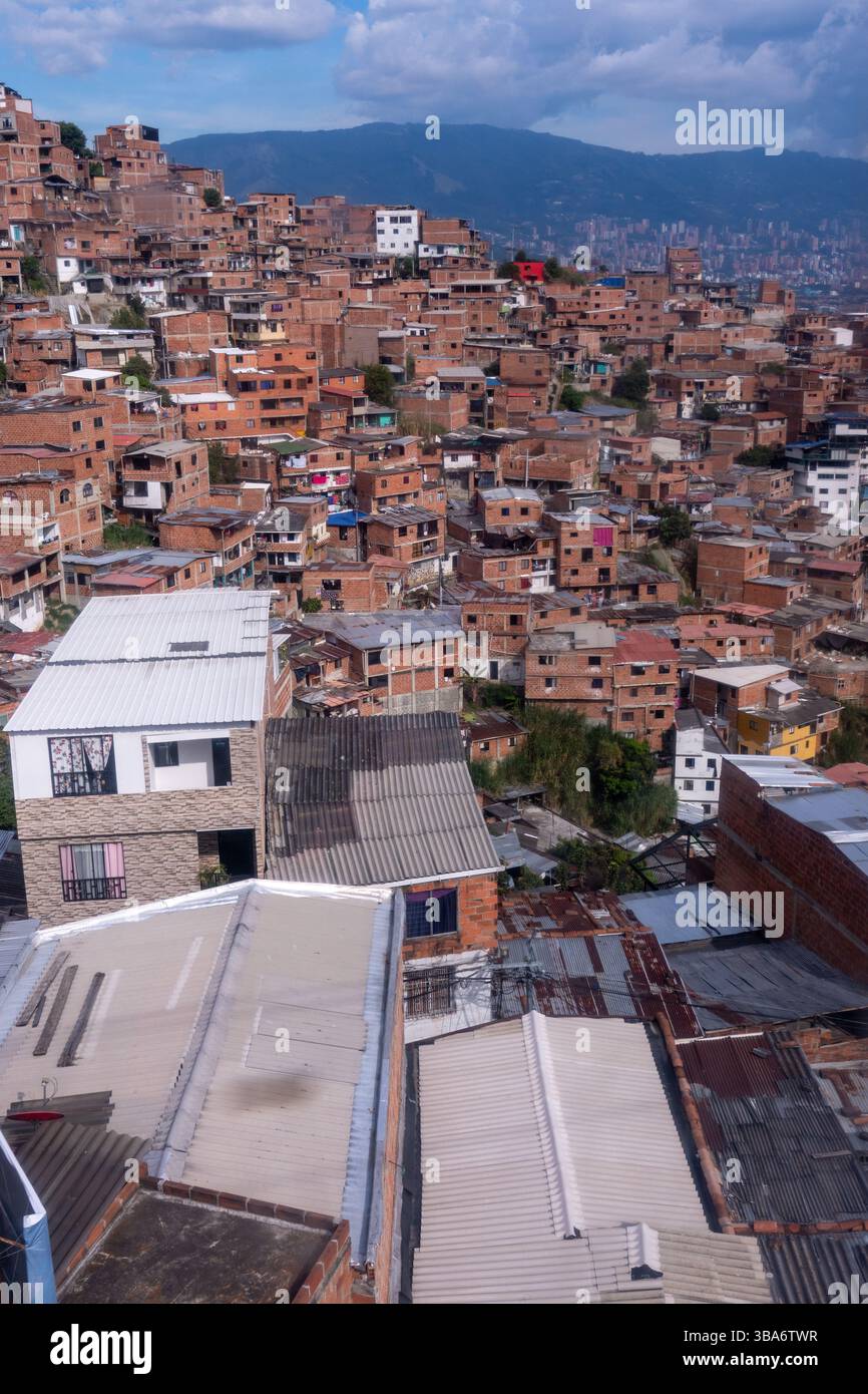 Cable car view of the hillside slums of Comuna 13, in Medellin ...